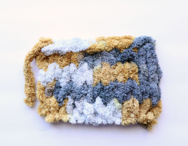 Make a gorgeous cable knit blanket with looping yarn (it's so easy ...